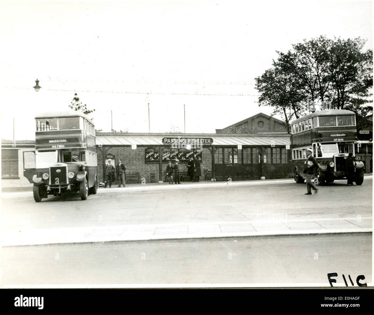 A photograph of a bus stop in Maidstone, capturing daily life and urban ...