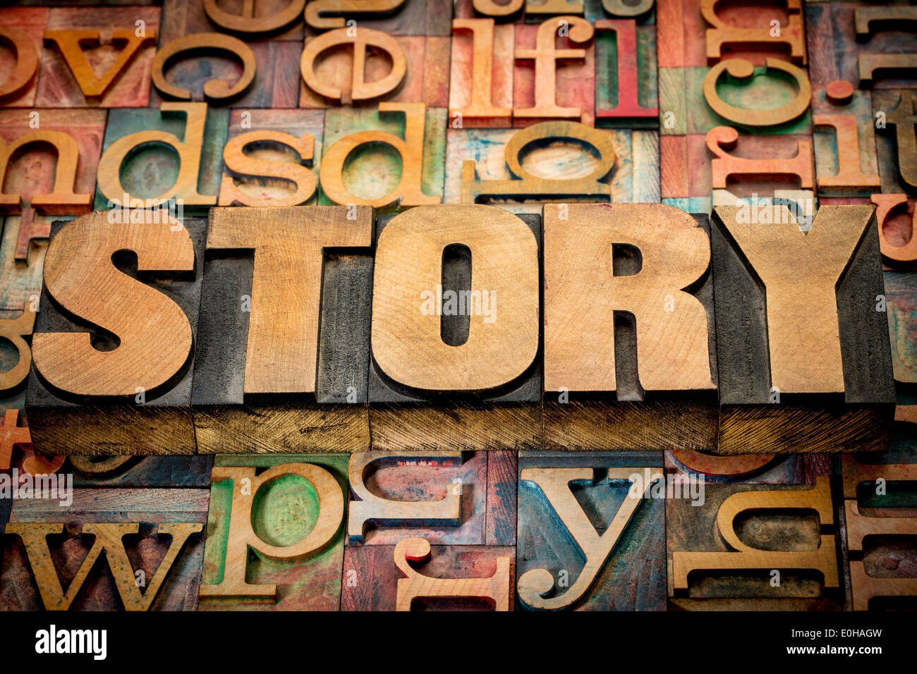 story word in wood type against background of letterpress printing ...