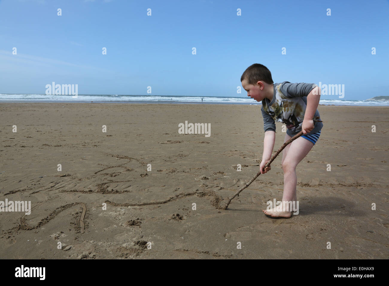 Stick writing in sand hi-res stock photography and images - Alamy