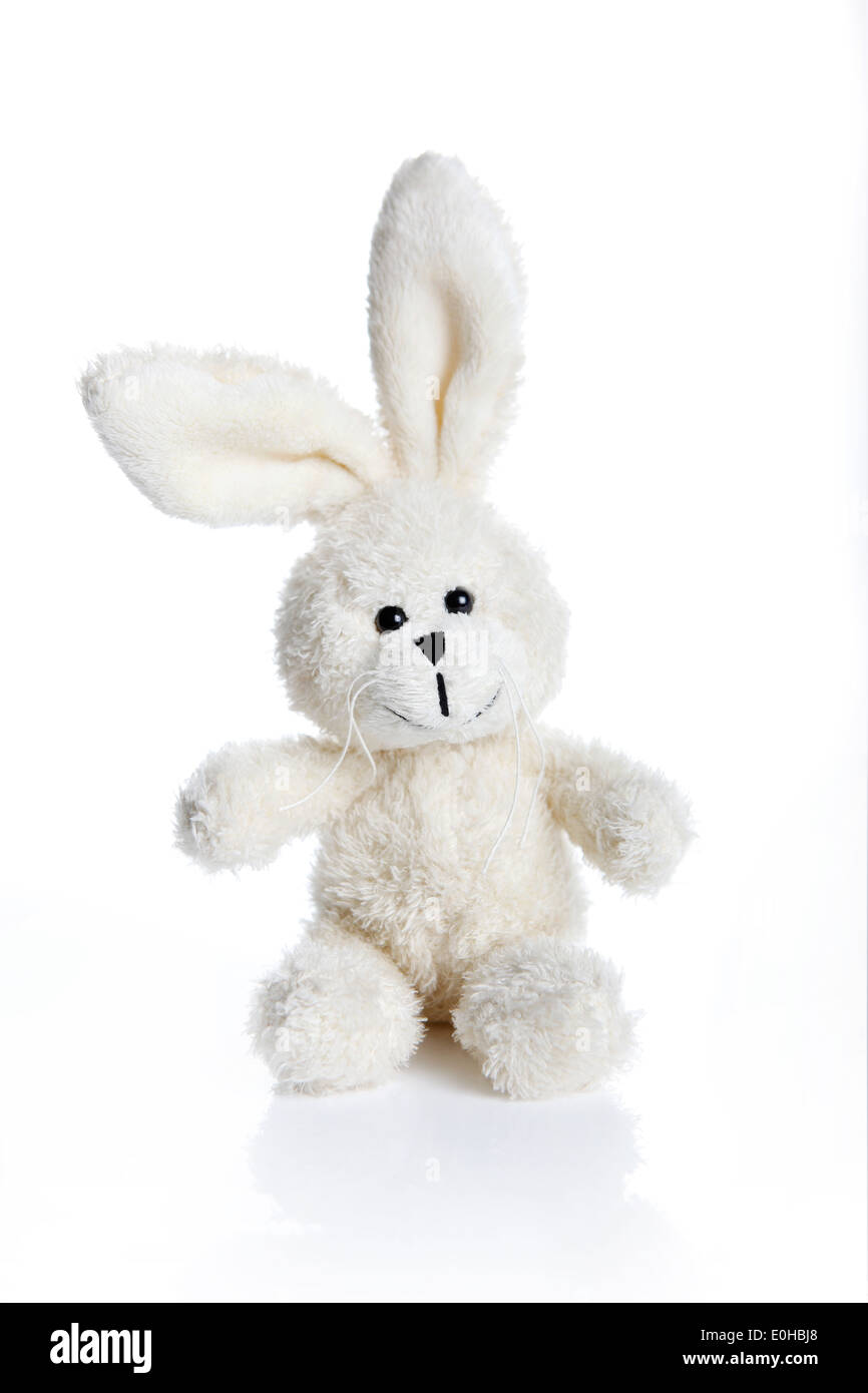 Sitting white stuffed bunny Stock Photo - Alamy