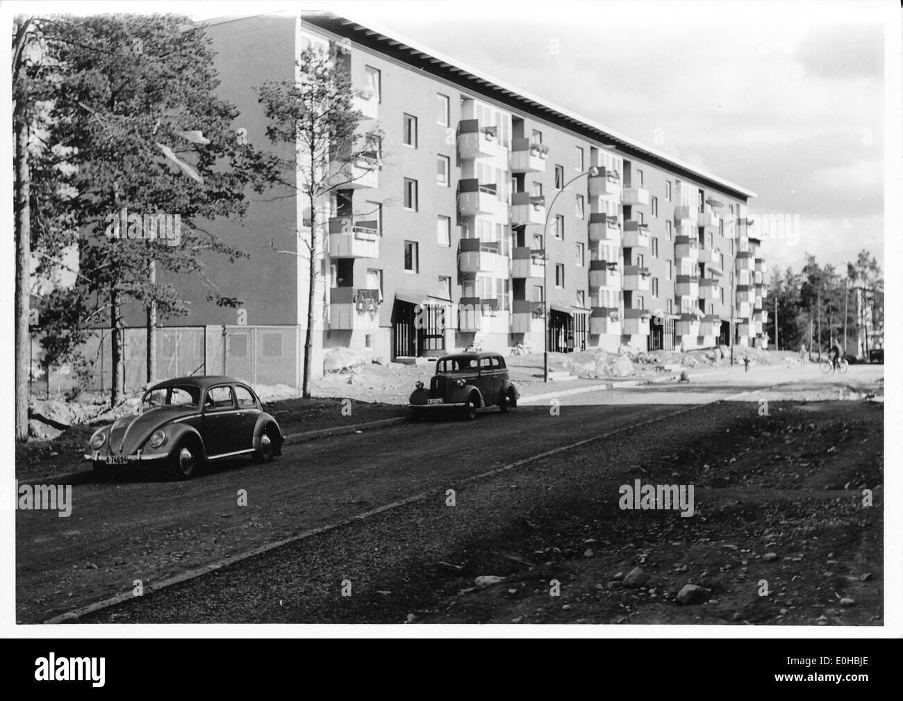 A photograph from 1962 showing residential buildings and cars in Oppsal ...