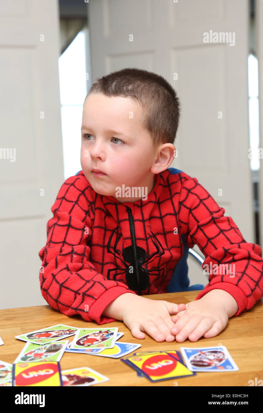 Child playing cards Stock Photo - Alamy