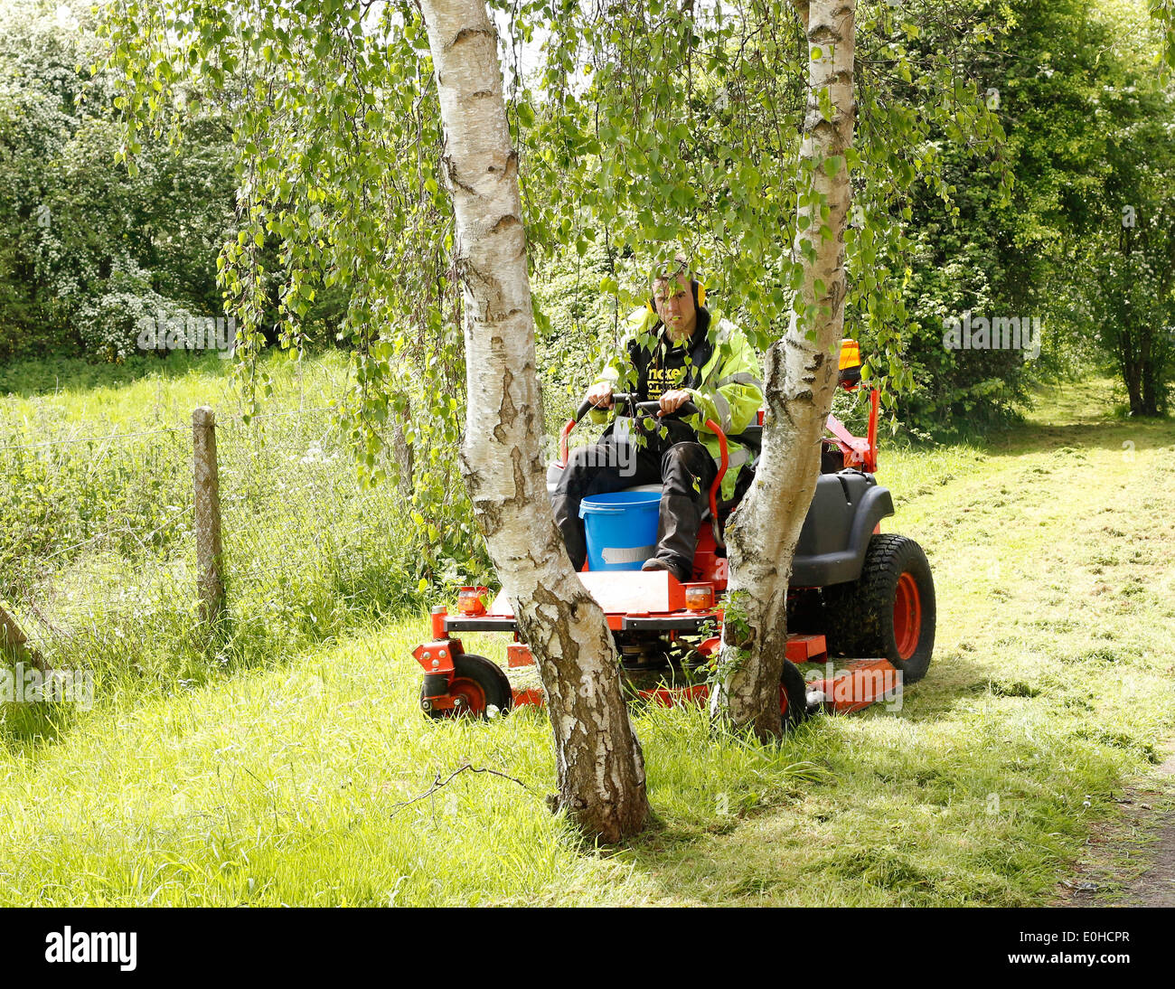 Mower worker hi-res stock photography and images - Alamy