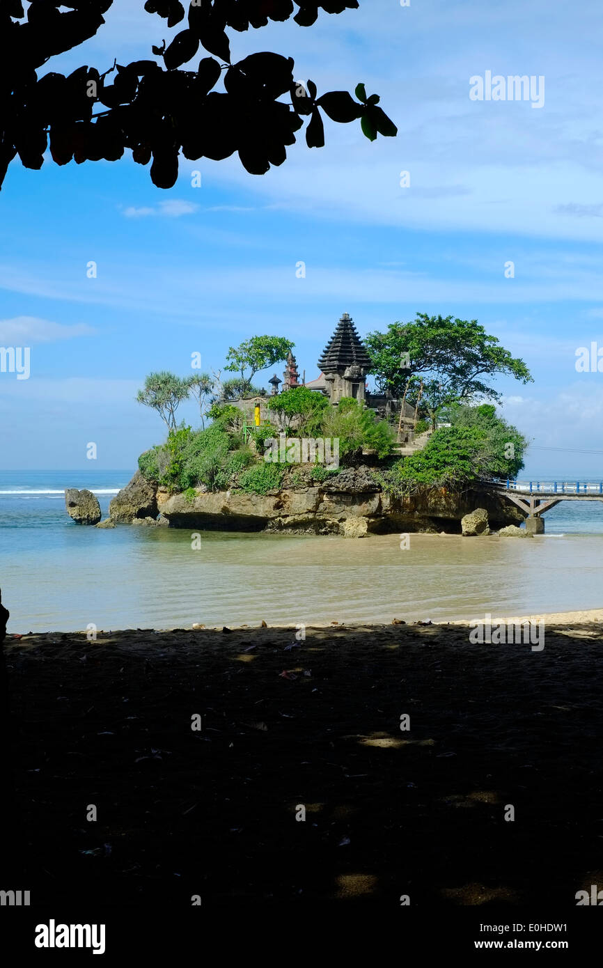 ismoyo island with amerta jati hindu temple off the beach and sea at ...