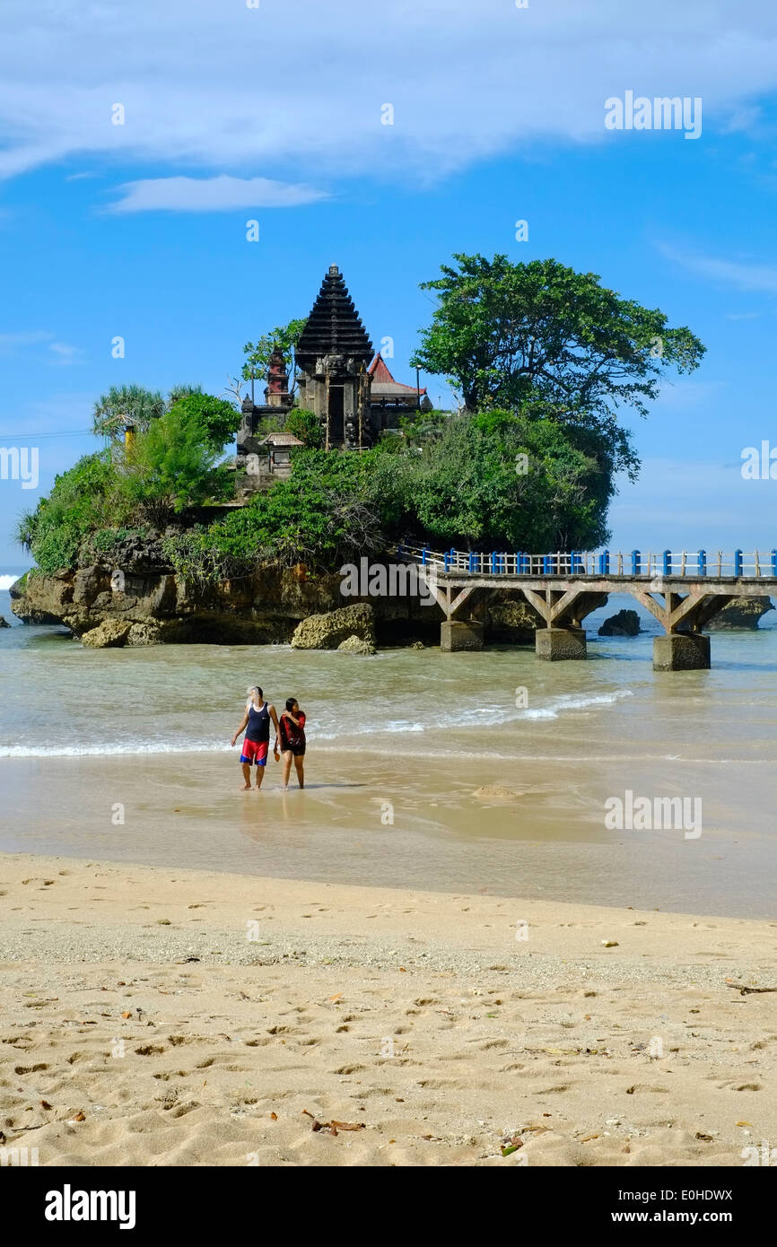 ismoyo island with amerta jati hindu temple off the beach and sea at ...