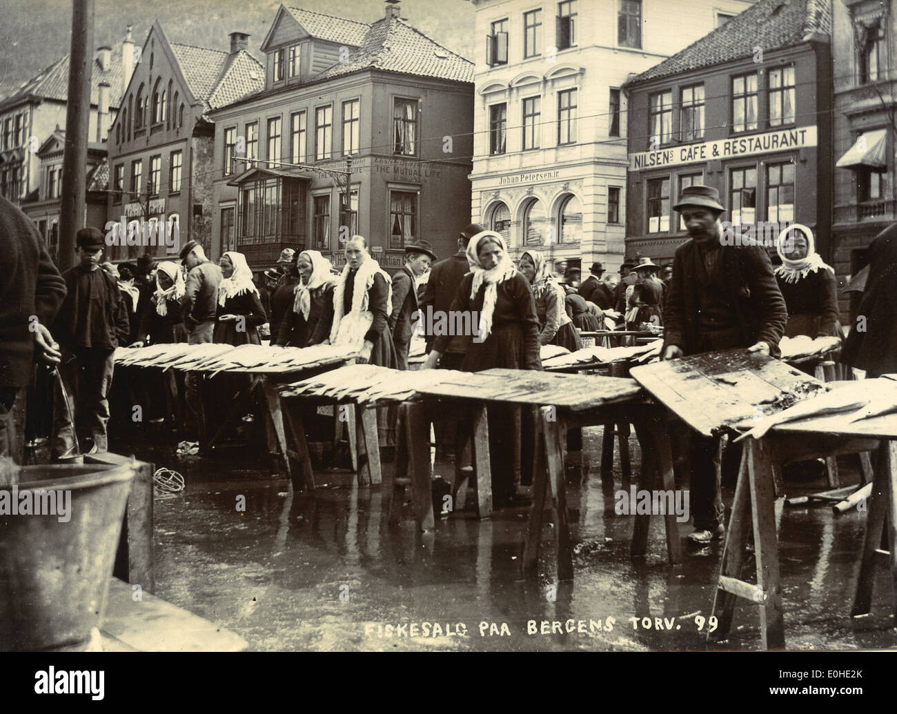 This photograph depicts a fish market at Bergen Torget, a historic ...
