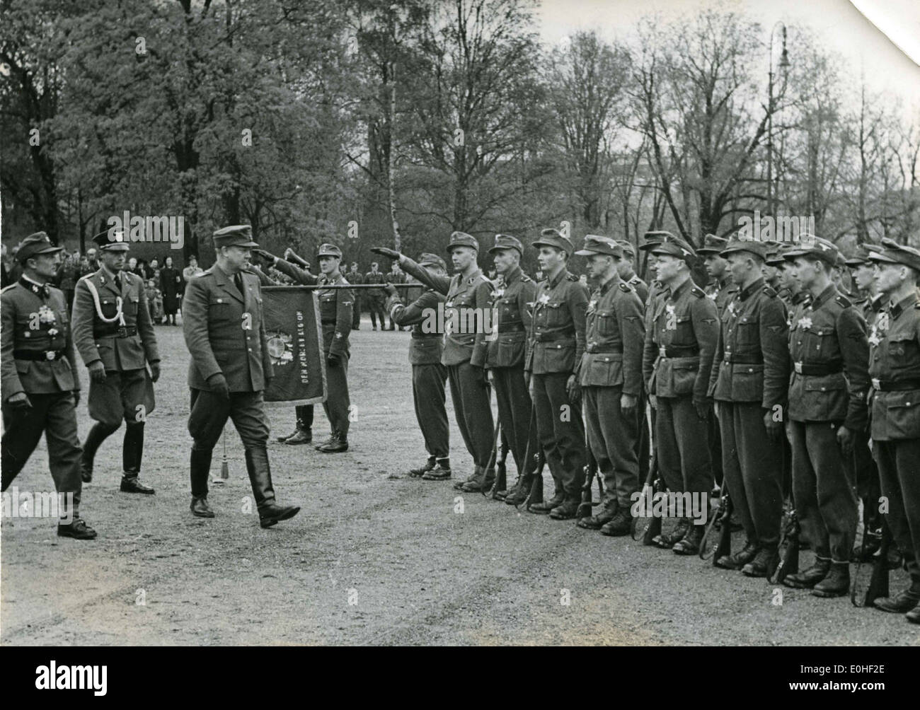 This image shows Vidkun Quisling inspecting the Den Norske Legion ...