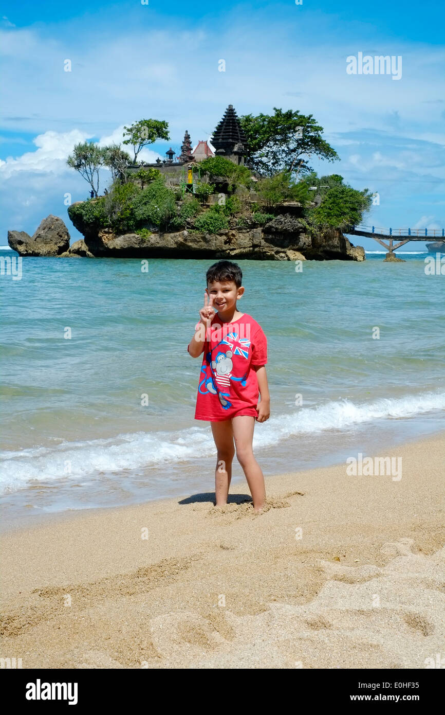 young local boy on the beach by the sea at balekambang east java ...
