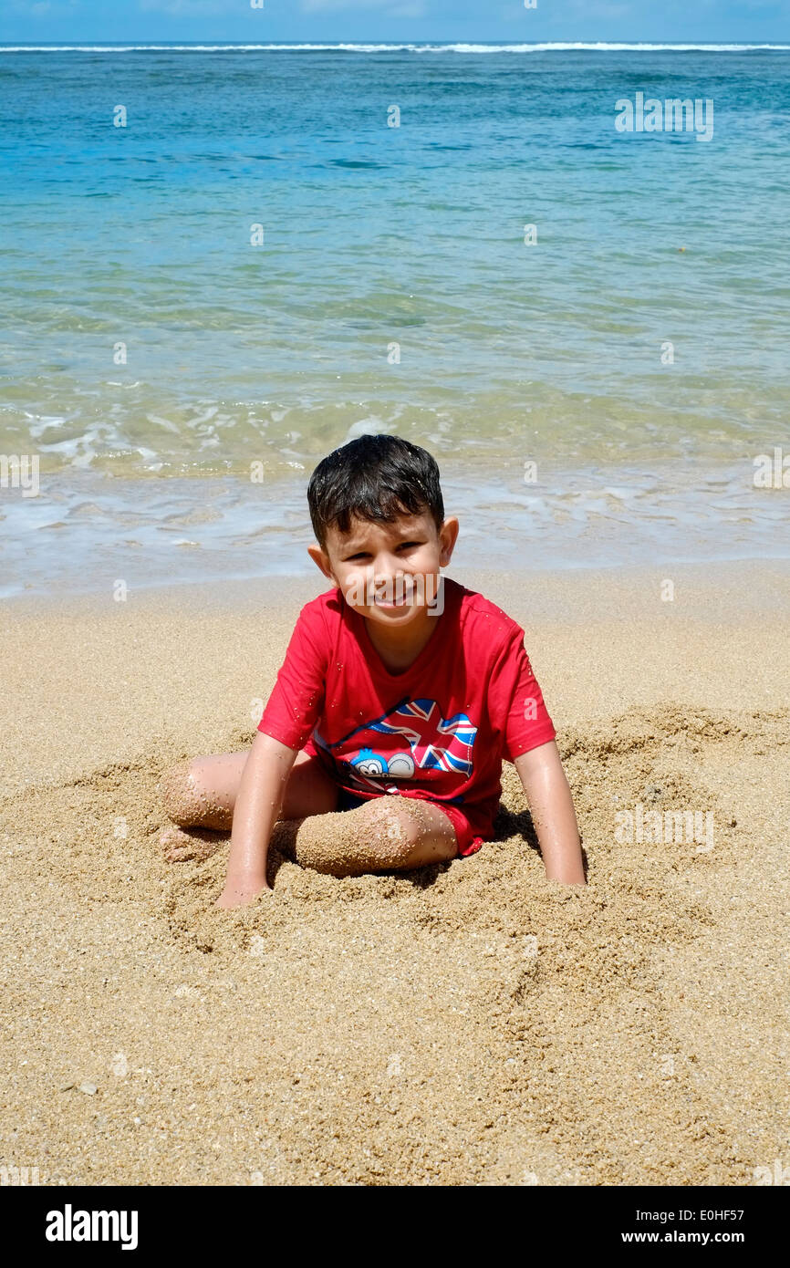 young local boy on the beach by the sea at balekambang east java ...