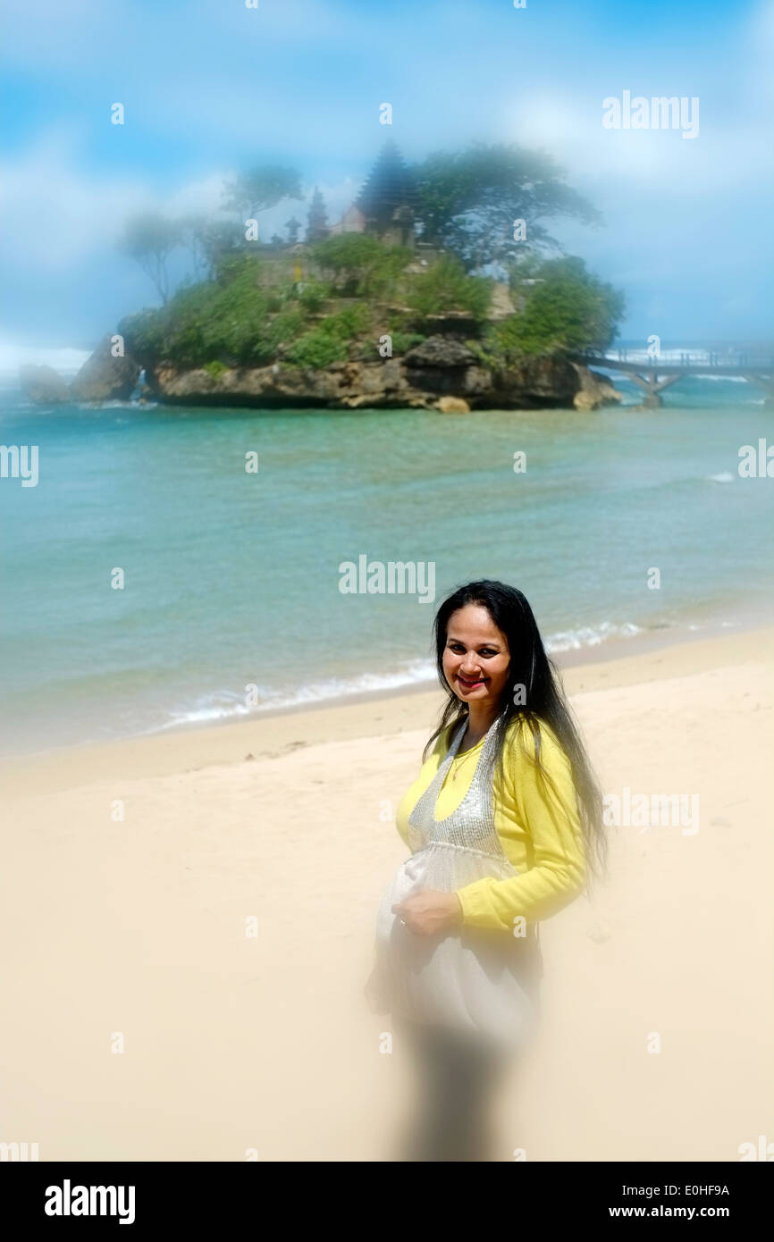 local pregnant woman on the beach by the sea at balekambang east java ...