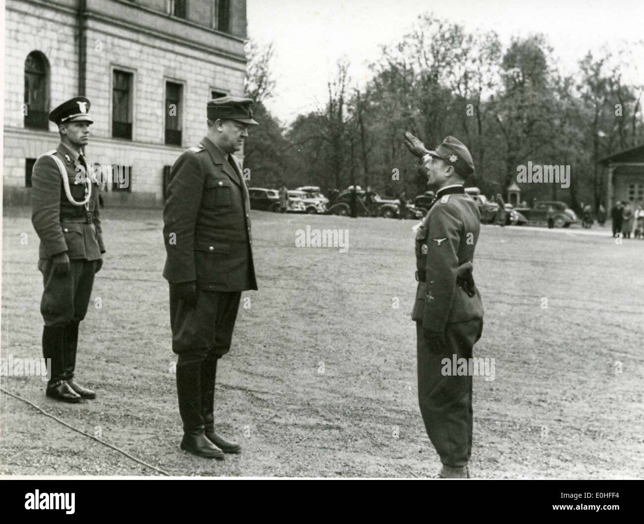 The photograph shows a ceremony at Slottsplassen, involving Vidkun ...