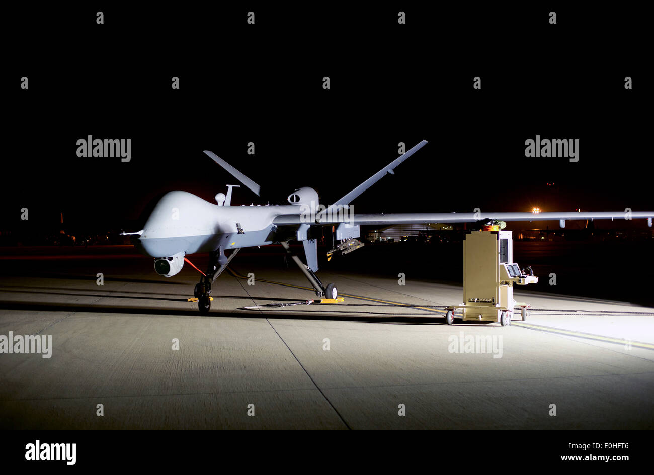 A US Air Force MQ-9 Reaper unmanned aerial vehicle sits on the flight ...