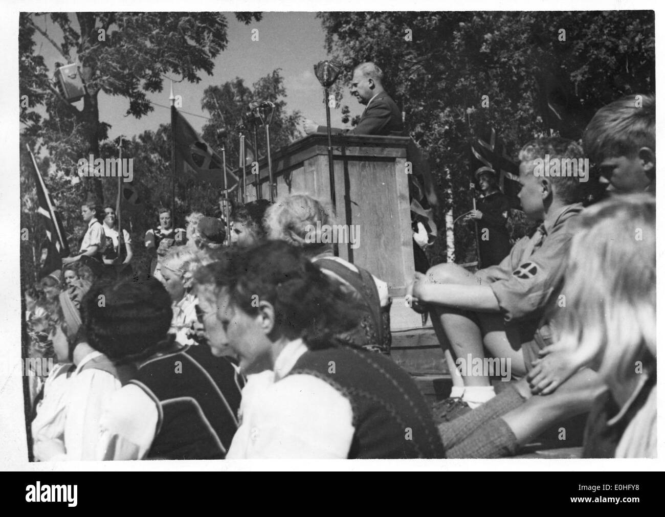 This image shows Vidkun Quisling speaking from the podium during World ...