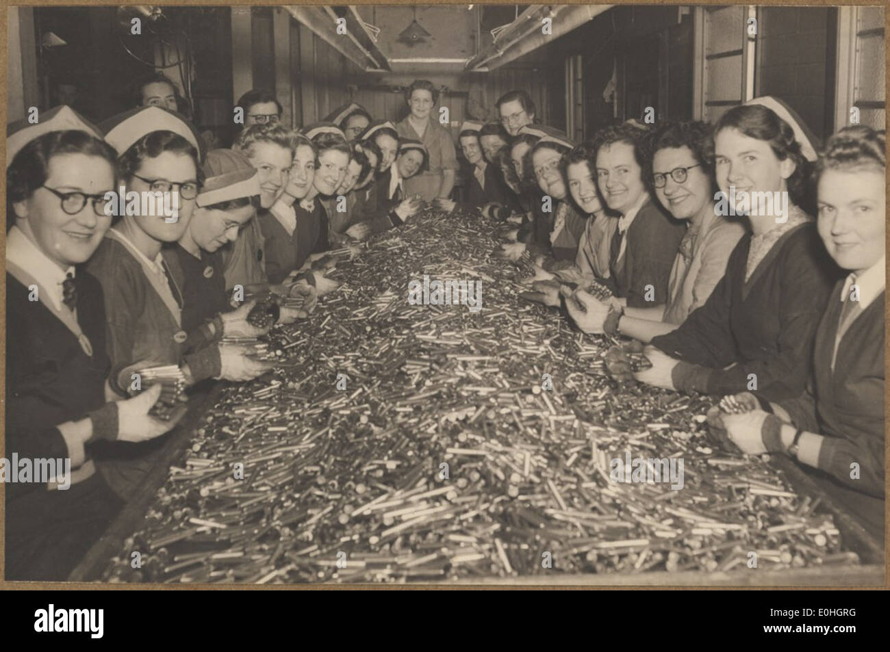 Wwii factory women hi-res stock photography and images - Alamy