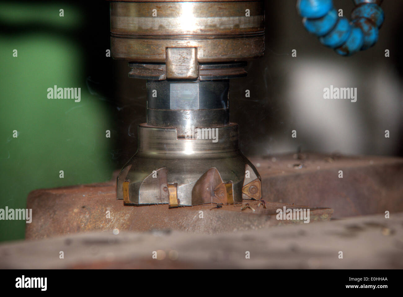 CNC milling machine with scrap in factory Stock Photo - Alamy