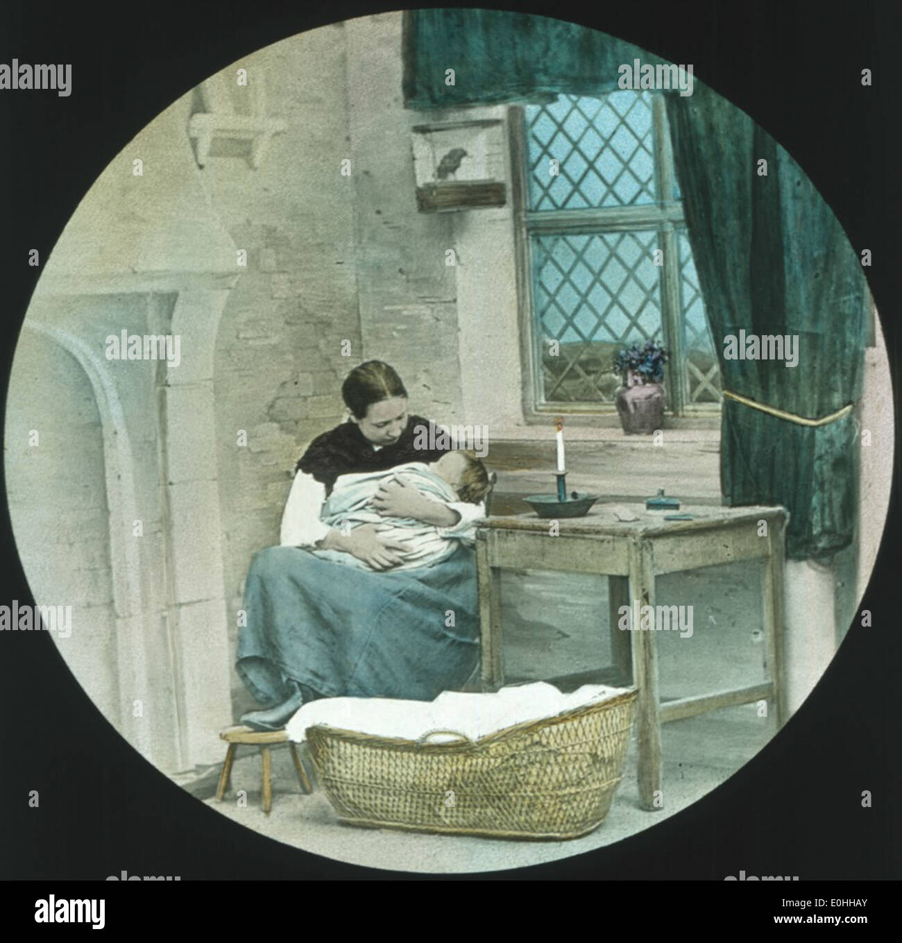 A 1926 lantern slide showing Jane Conquest nursing her sick baby, part ...
