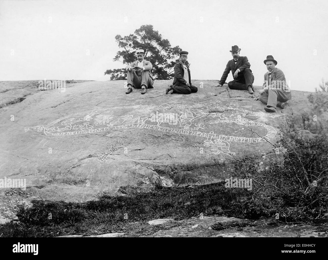 Stone age stone carvings on a rock Black and White Stock Photos ...