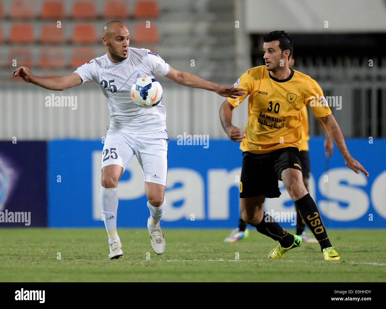 Kuwait City. 13th May, 2014. Omar Al Suma (R) of Kuwait's Qadsia SC ...