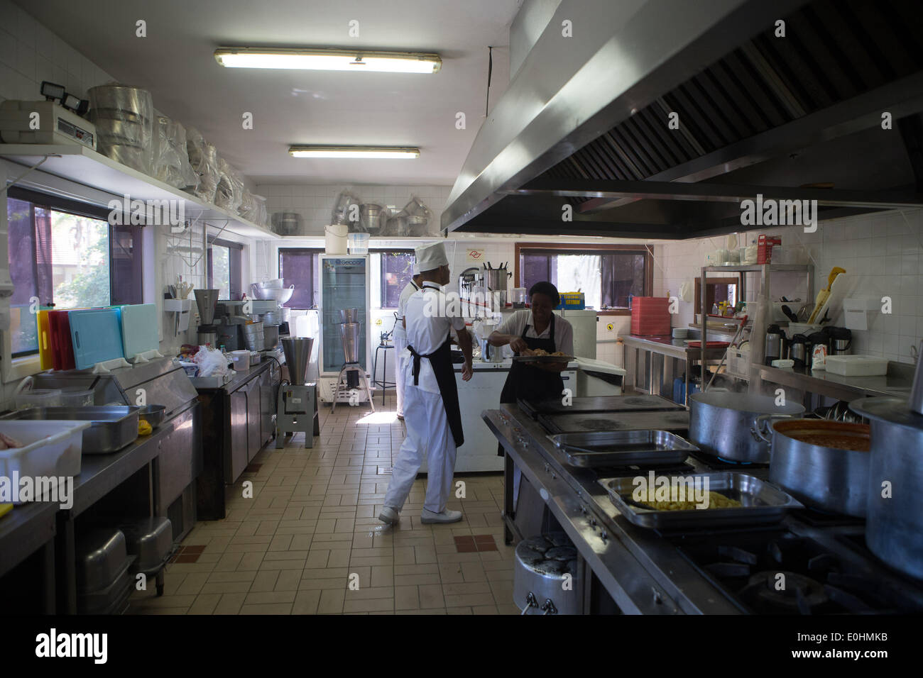 Sao Paulo, Brazil. 12th May, 2014. Staff members work in the kitchen in ...