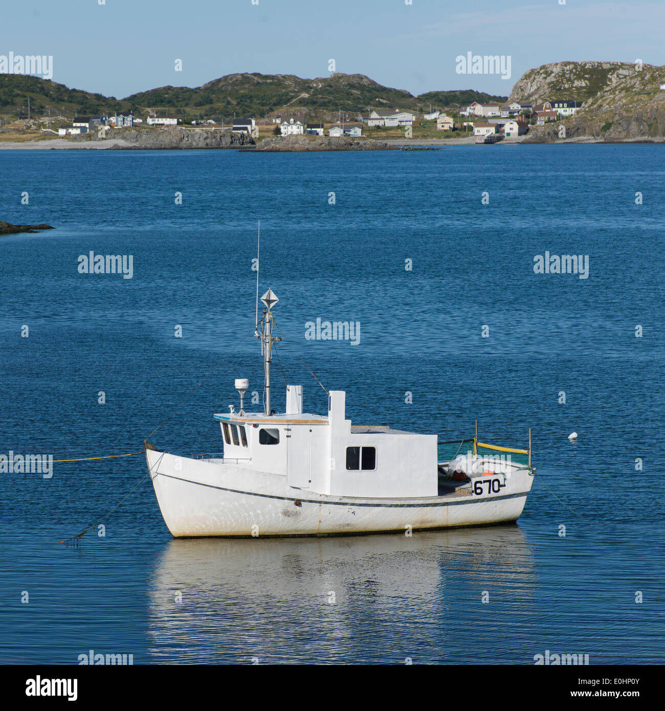 Trawler Fishng Boat at harbor with town in background, Twillingate ...