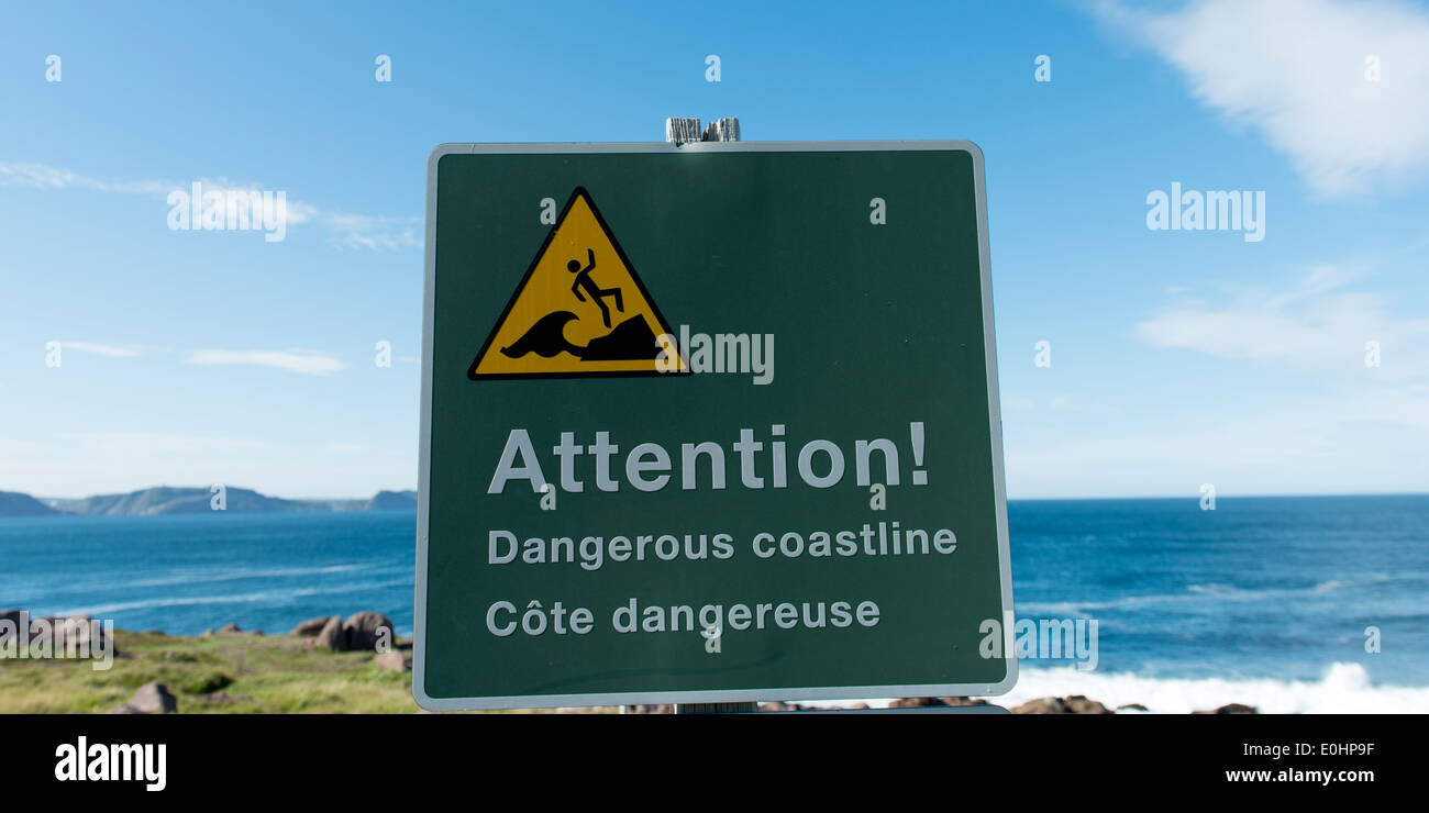 Warning sign at coast, Cape Spear, St. John's, Newfoundland And ...