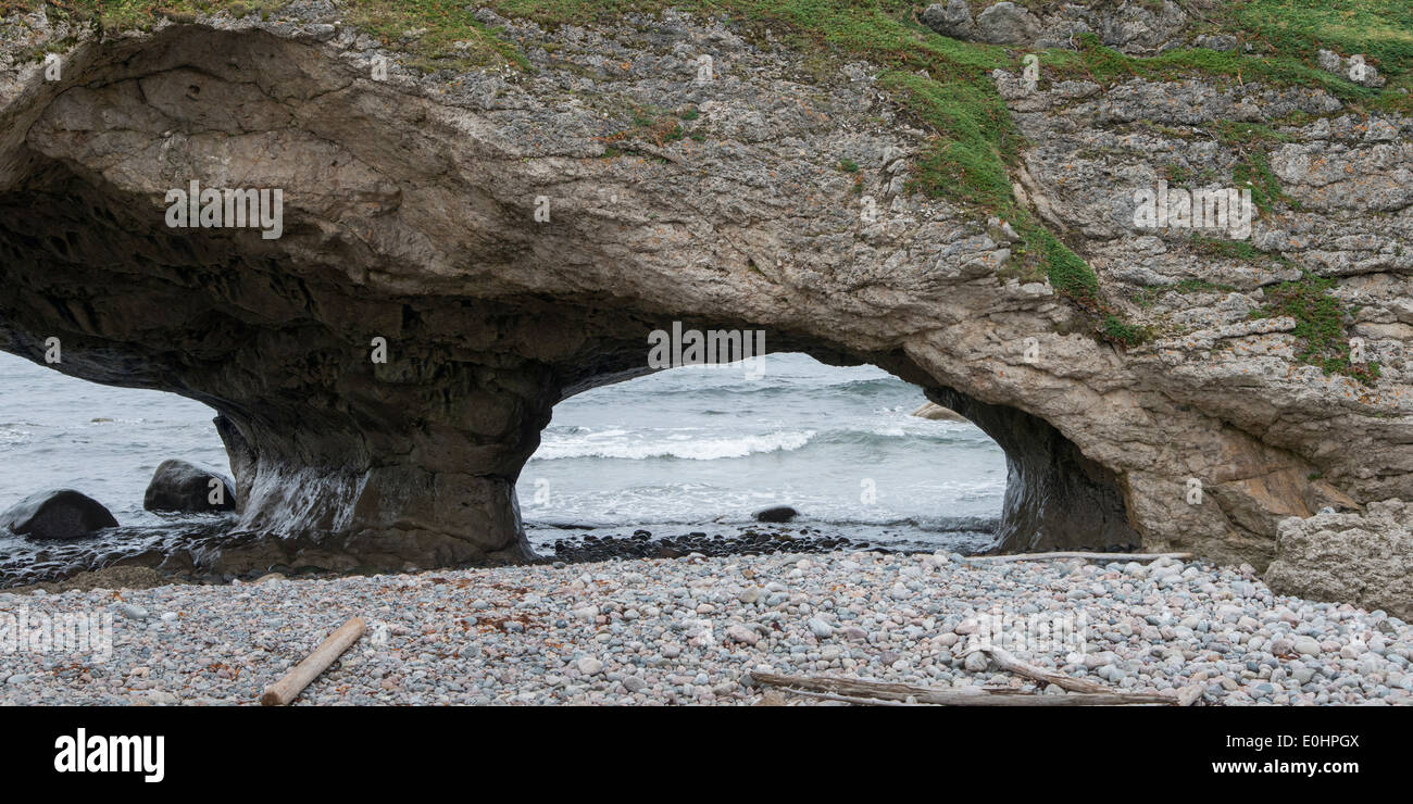 Natural arch formation at coast, Portland Creek, Gros Morne National ...