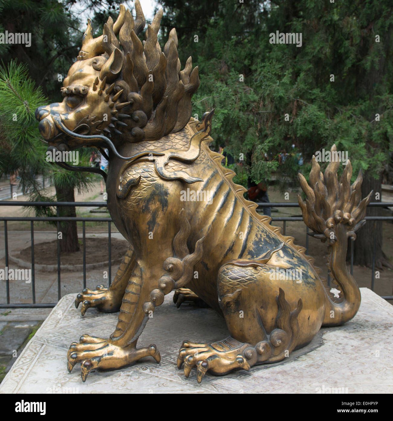 Guardian statue in the garden of a palace, Forbidden City, Xicheng ...