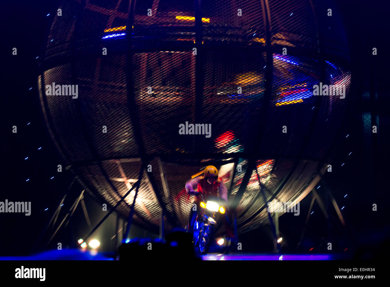 Person performing stunt on a motorcycle at acrobatics show, Beijing ...