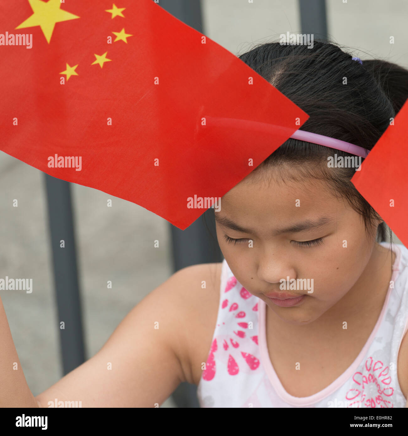 Child holding chinese national flag hi-res stock photography and images ...