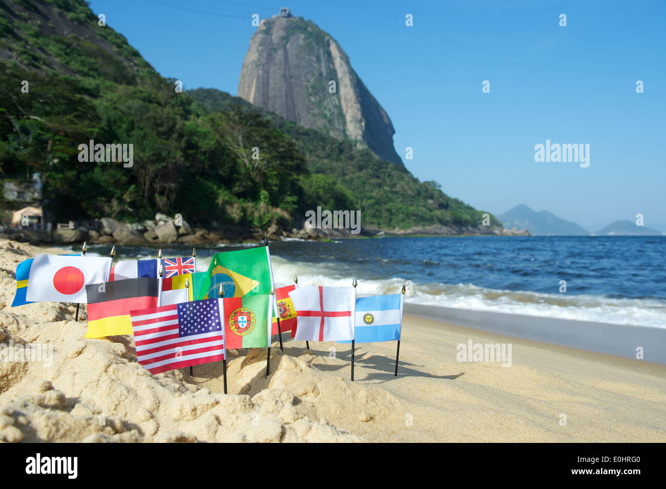 International flags on Praia Vermelha Red Beach at Sugarloaf Mountain ...