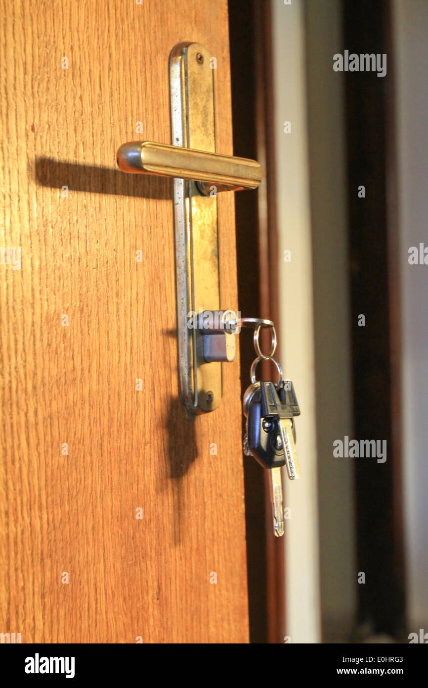 Door key left in door hi-res stock photography and images - Alamy