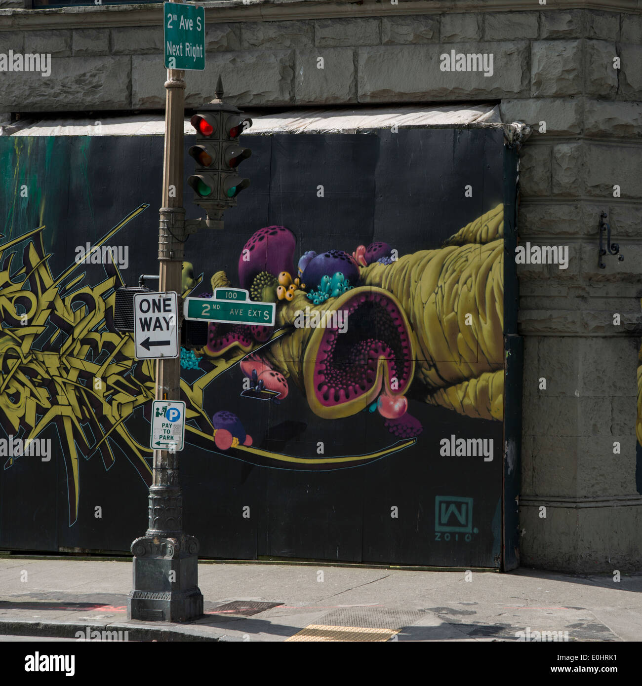 Traffic signal in front of a giant poster, Pioneer Square, Seattle ...