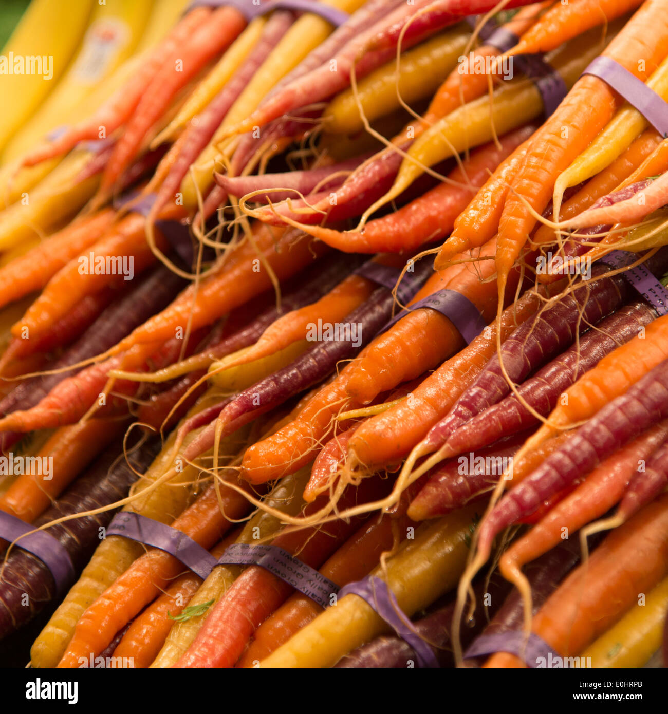 Stack of carrots for sale at a market stall, Pike Place Market, Seattle ...
