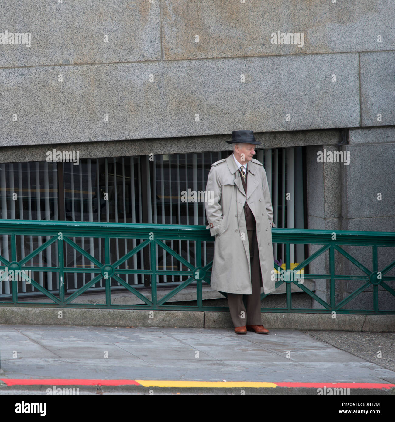 Leaning against railing hi-res stock photography and images - Alamy