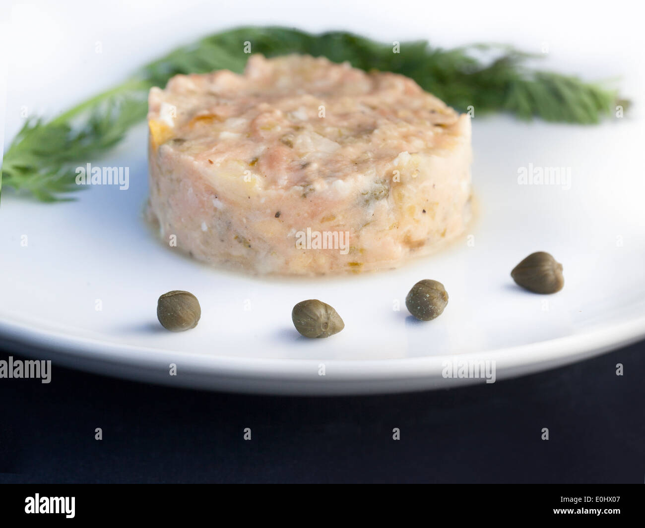 Salmon tartar with capers Stock Photo - Alamy