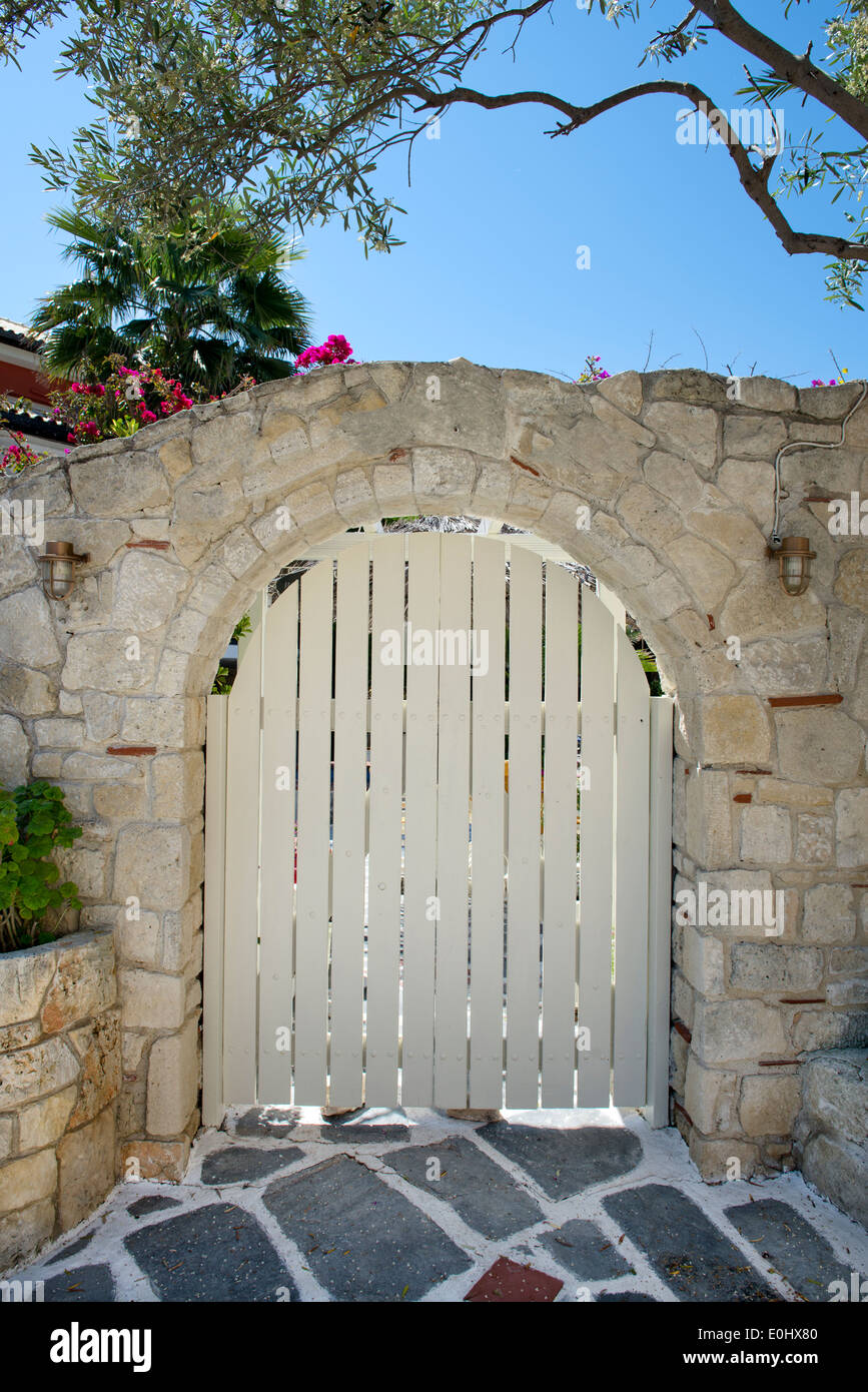 Stone wall wooden fence hi-res stock photography and images - Alamy