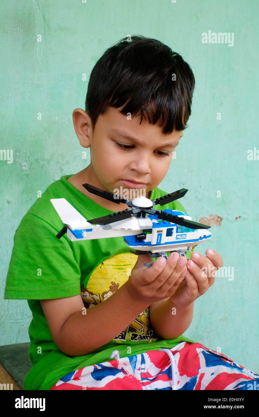 little boy playing with lego Stock Photo - Alamy