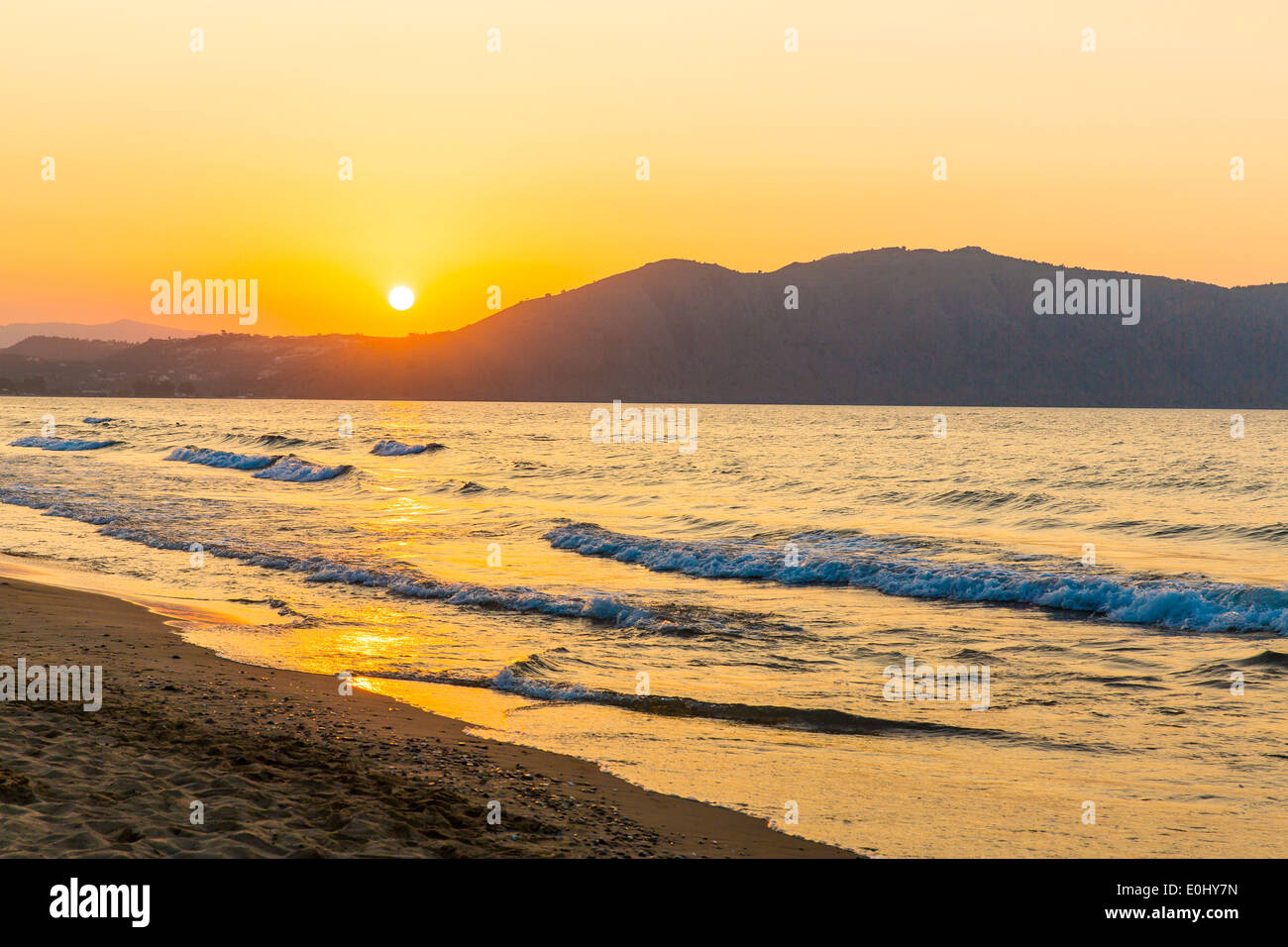 Beach on sunset in village Kavros in Crete island, Greece. Magical ...