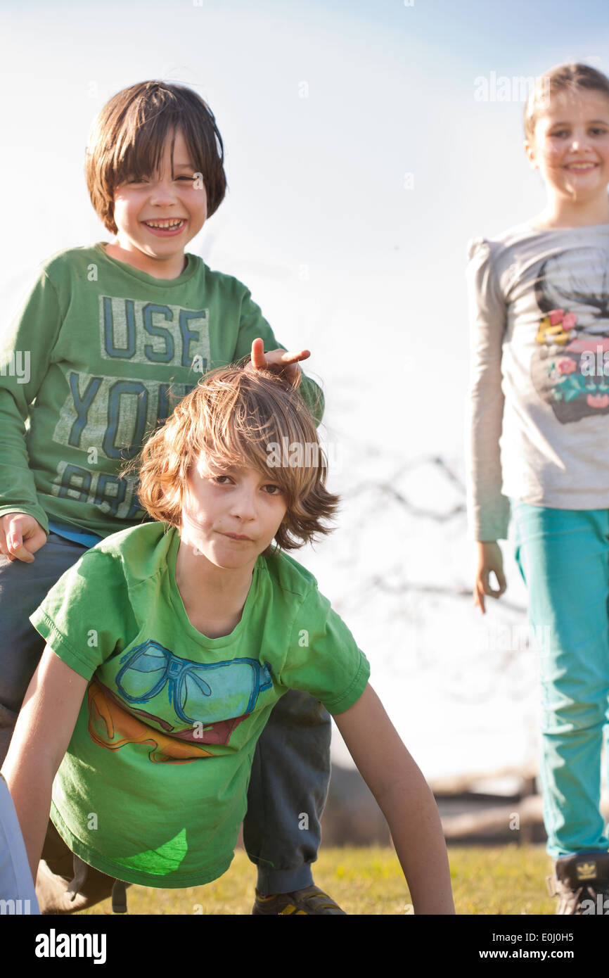 Children making jokes Stock Photo - Alamy