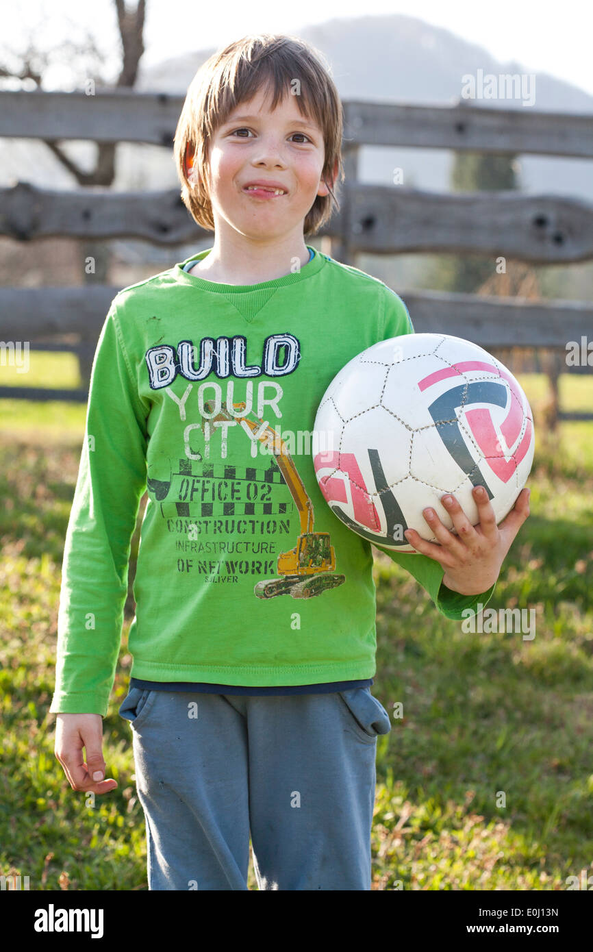 Boy playing outdoor Stock Photo - Alamy