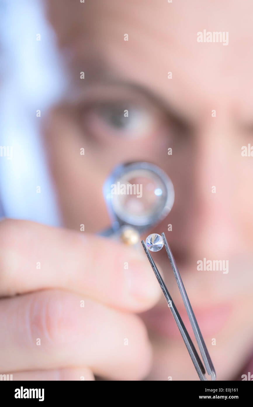 Inspecting jewelry hi-res stock photography and images - Alamy