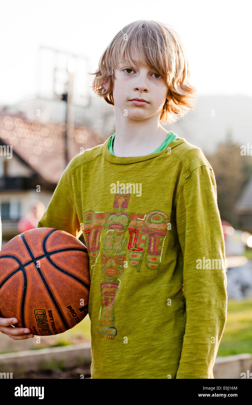 Boy playing outdoor Stock Photo - Alamy