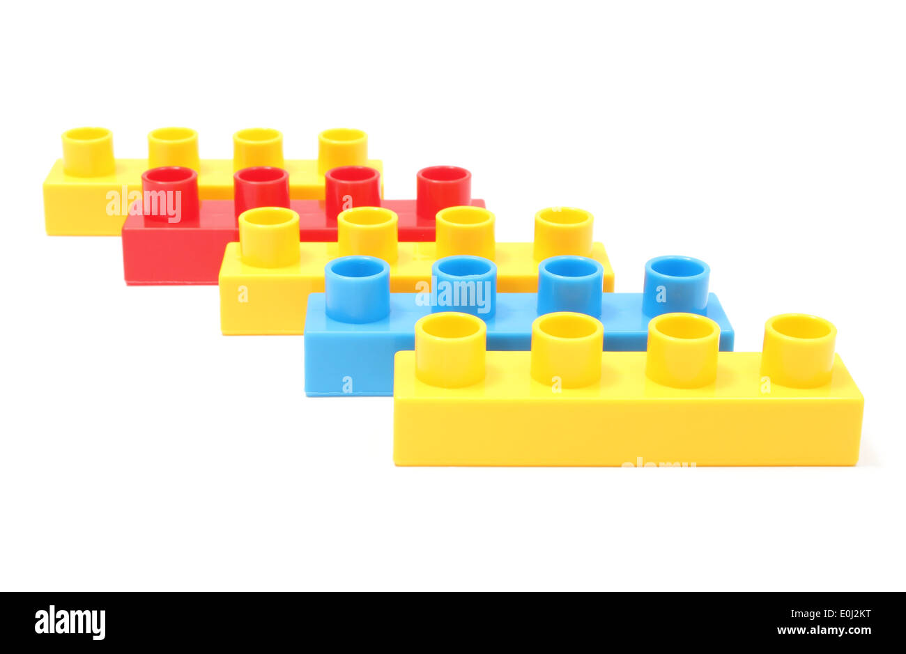 Closeup of colorful building blocks for children. Isolated on white ...