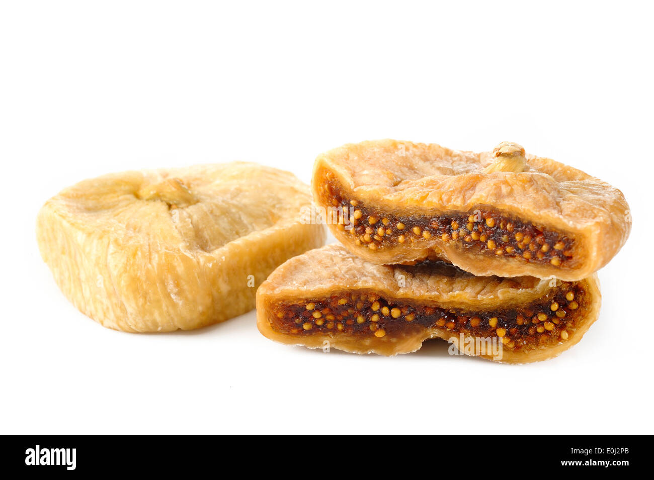 dried fig on white background Stock Photo - Alamy