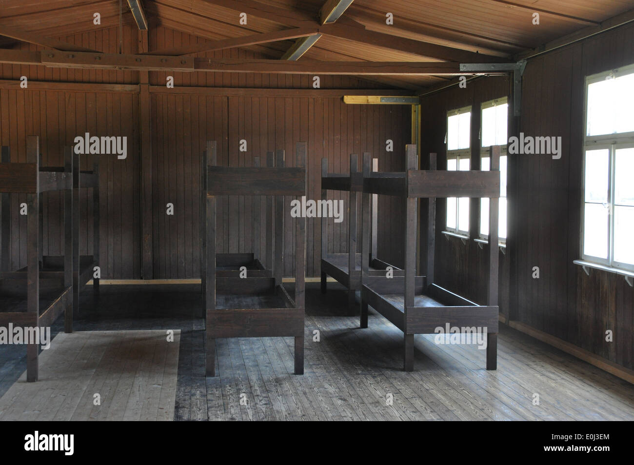 Bunk bed frames in the barracks of at Mauthausen concentration camp ...