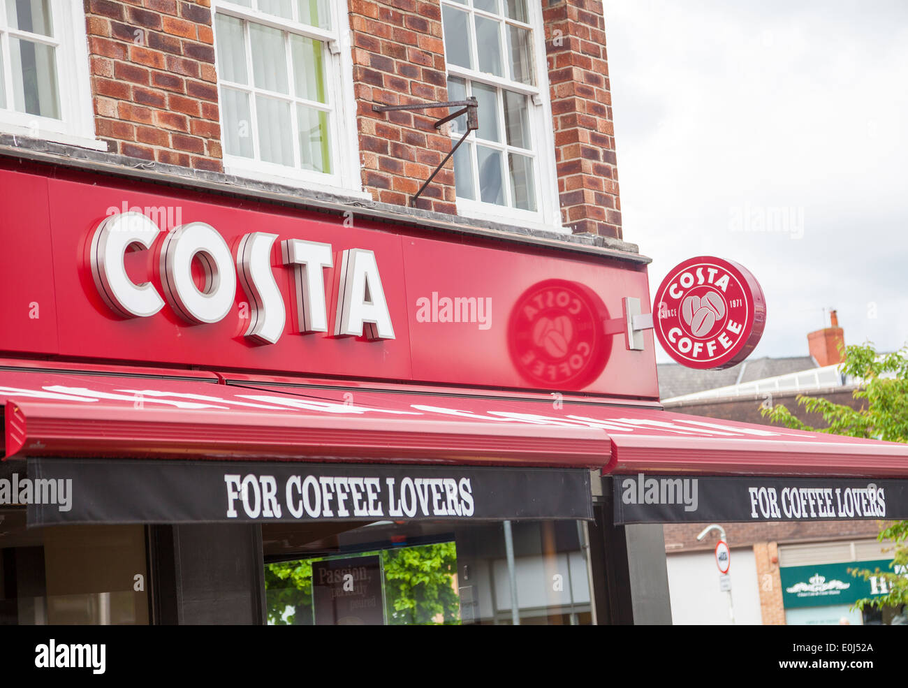The red sign of a Costa Coffee shop saying 'for coffee lovers' Stock ...