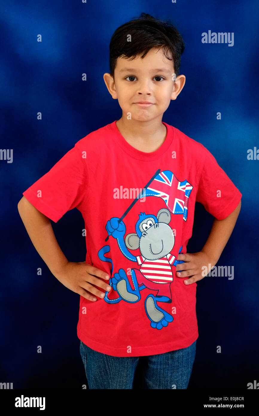 little boy poses in england t shirt at school to commemorate the ...
