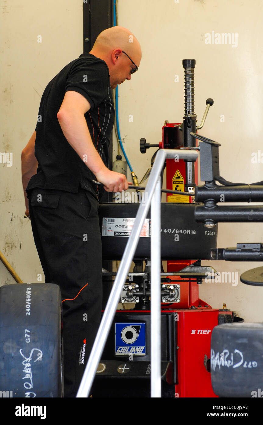 Tyre fitter hi-res stock photography and images - Alamy