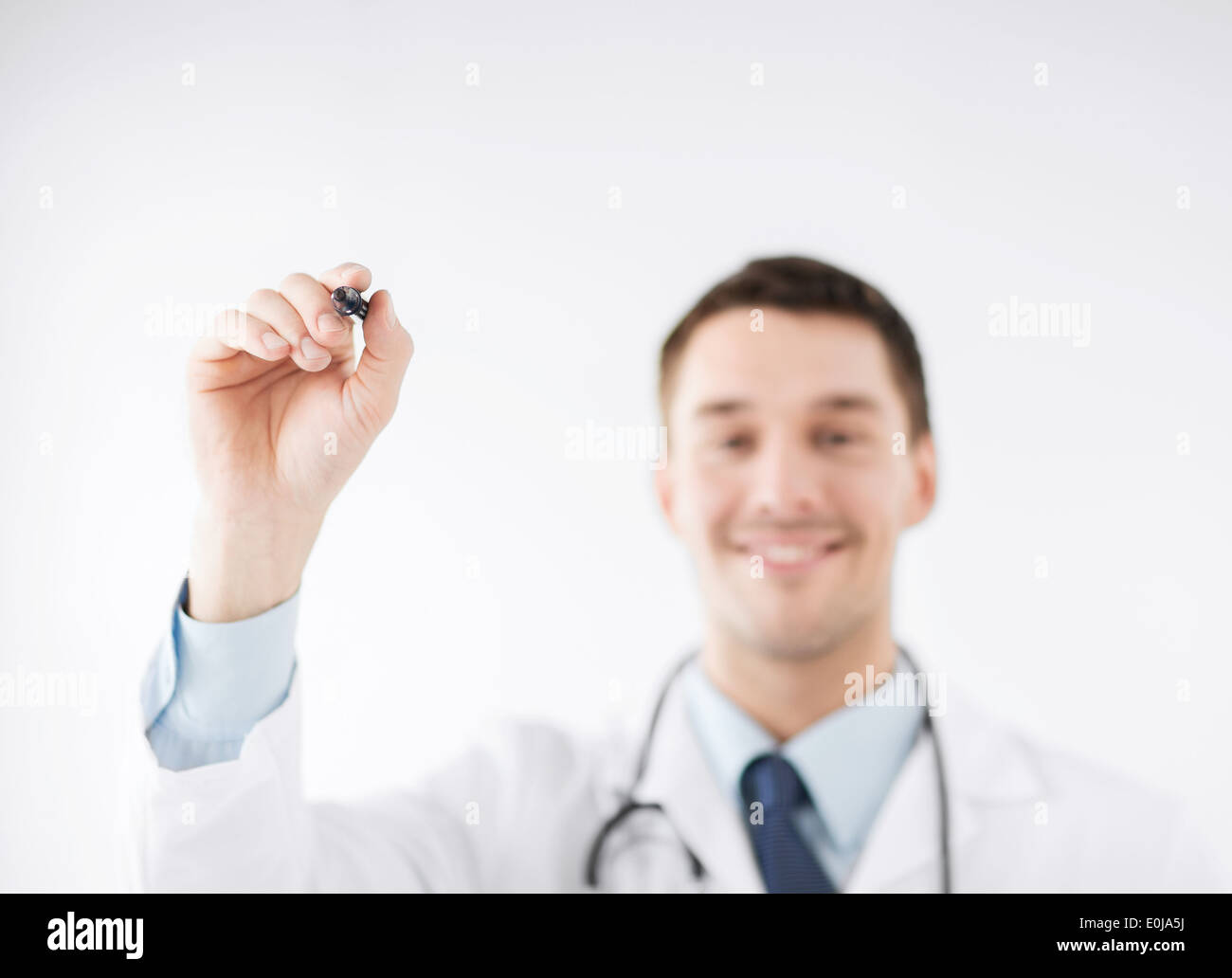 doctor writing something in the air Stock Photo - Alamy
