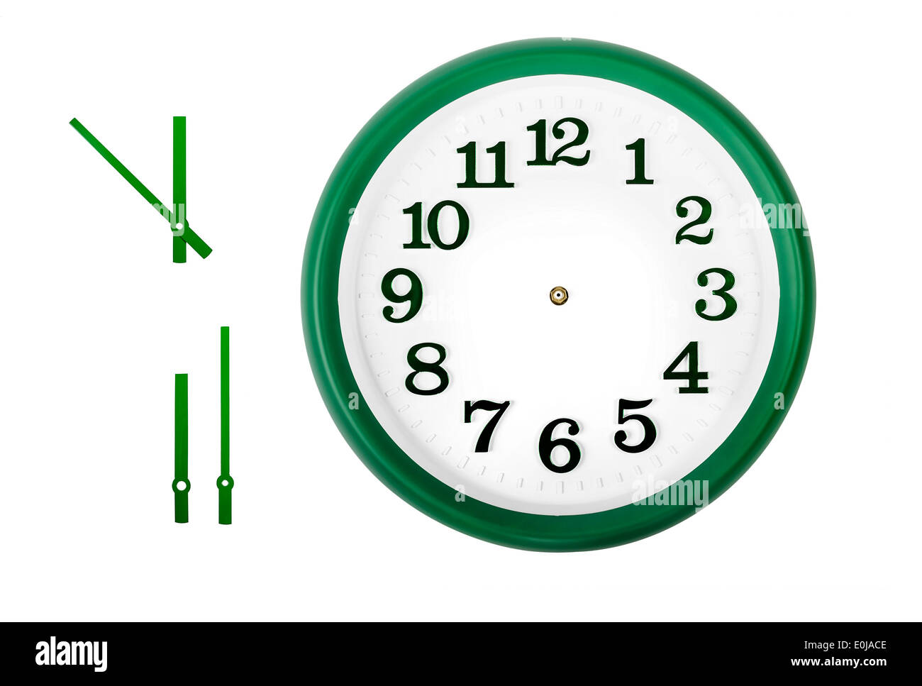 Green wall clock isolated on white background Stock Photo - Alamy